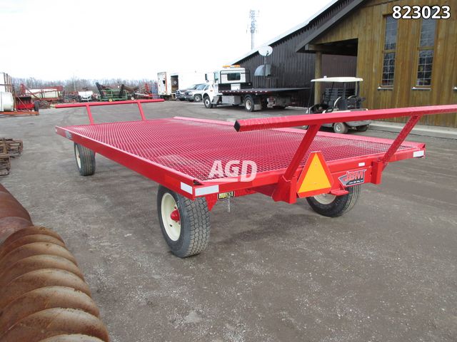 New John BM Mfg Ltd. Flat Rack Bale Wagon | AgDealer