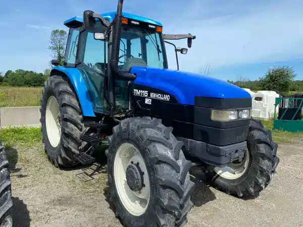 Used 2000 New Holland TM115 Tractor